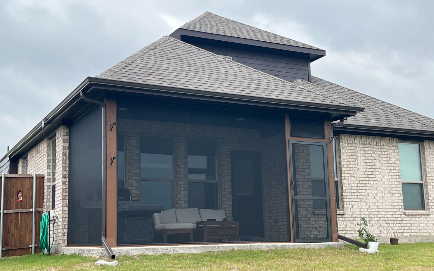 A handsome Royse City screen porch conversion turns this covered patio ...